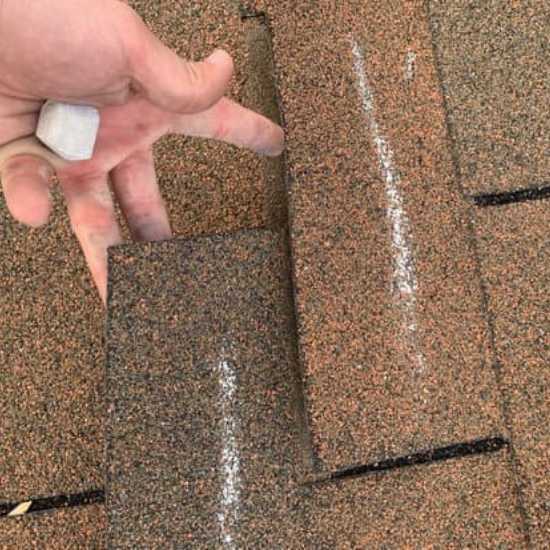 What Wind Damage Looks Like On A Roof (And Why Homeowners Miss It)